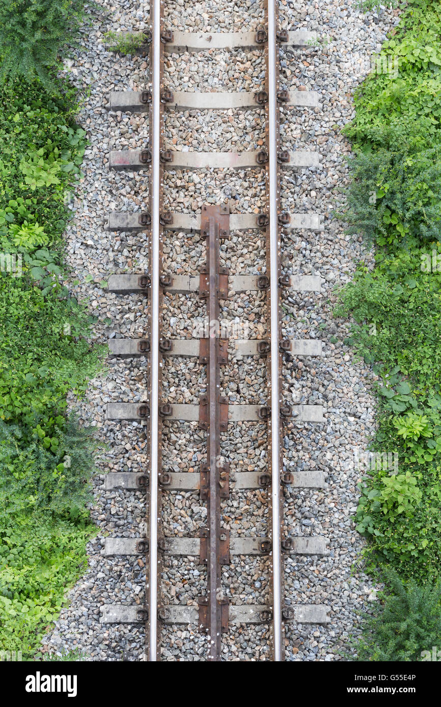 railway top view with stone and green plant beside railway, abstract ...