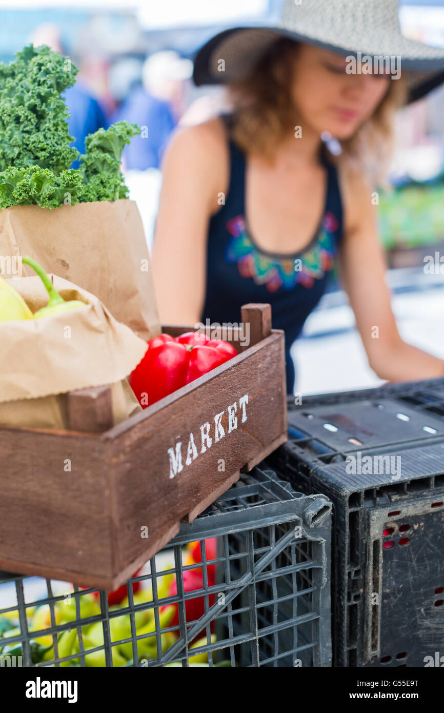 Young woman shopping at the local Farmers market Stock Photo - Alamy