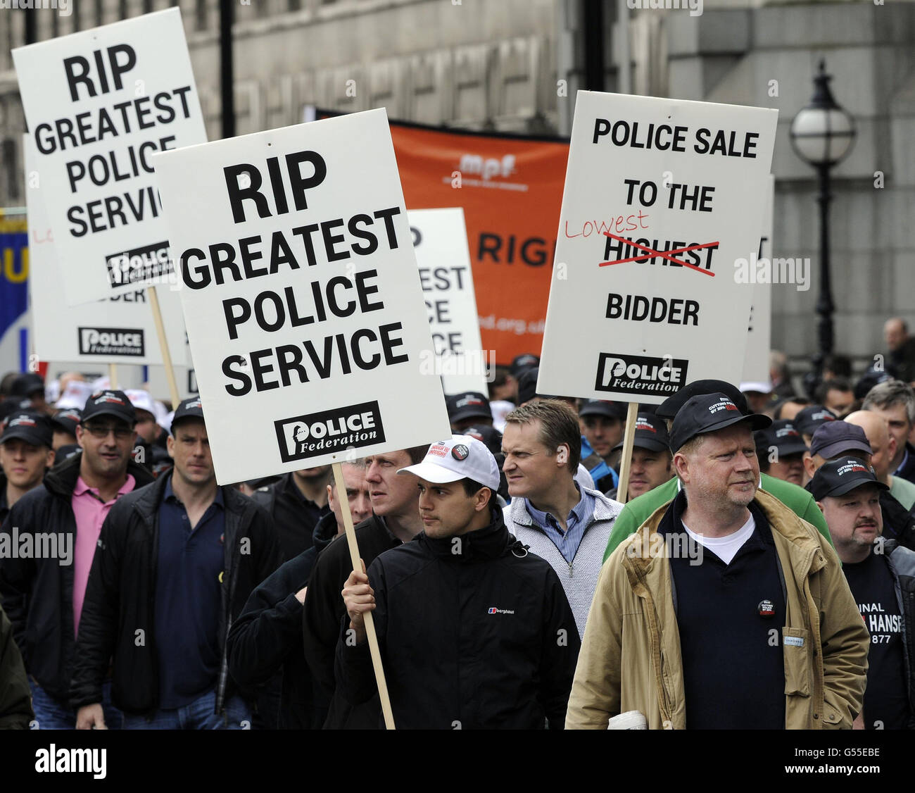Police Federation members march during a protest against spending cuts ...