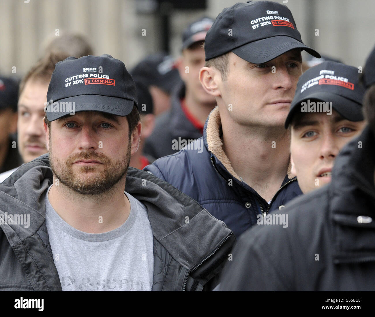 Police Federation members march during a protest against spending cuts ...