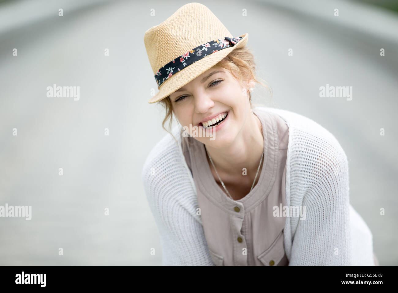 Headshot Portrait Of Laughing Beautiful Caucasian Woman Wearing Casual