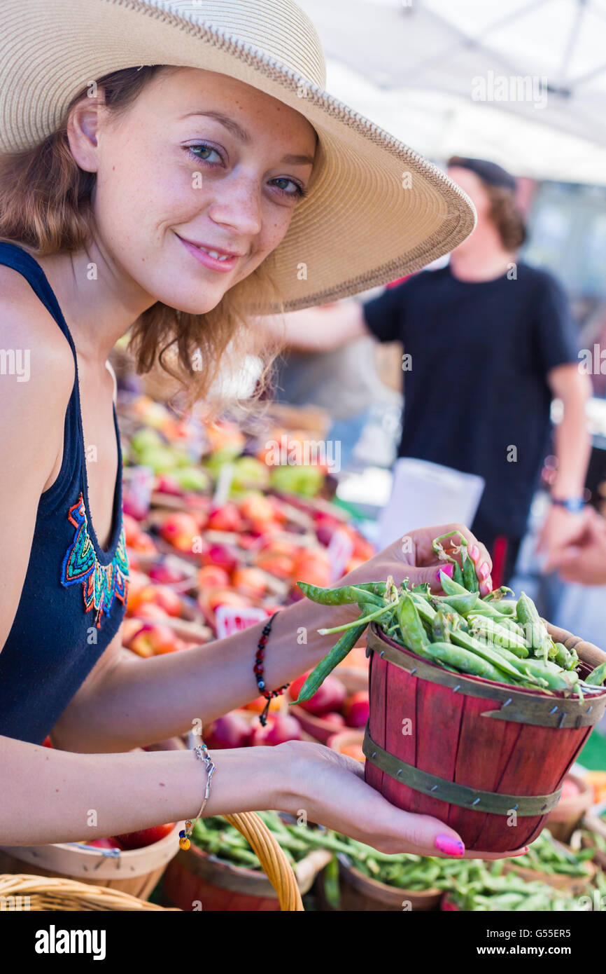 Young woman shopping at the local Farmers market Stock Photo - Alamy