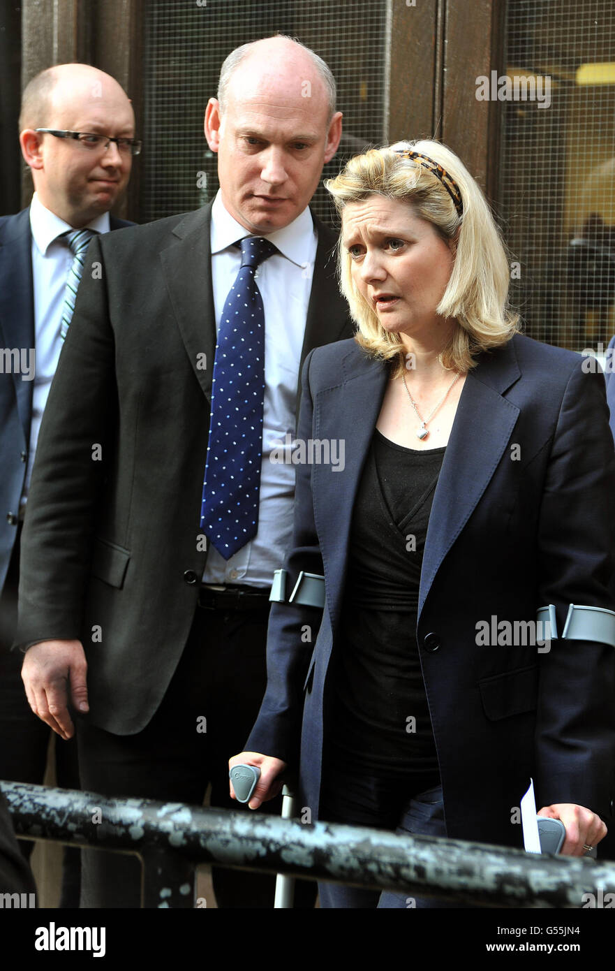 Kate and Chris Hollis pose for the media outside the West London ...