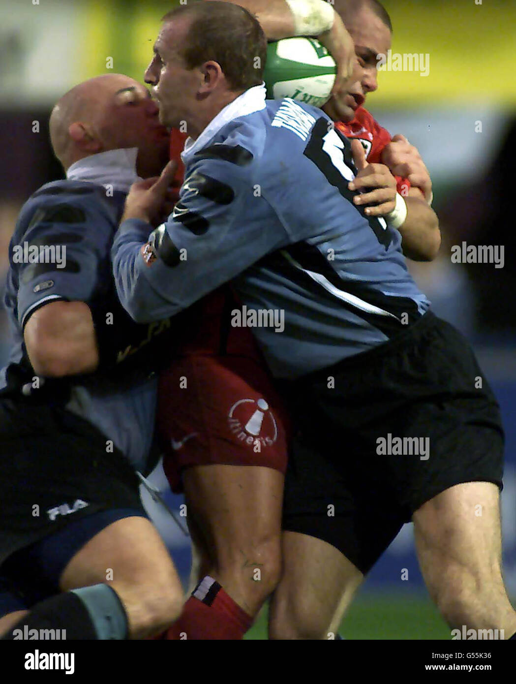 Cardiff RFC's (blue and black) Craig Quinnell (L) and Gareth Thomas in ...