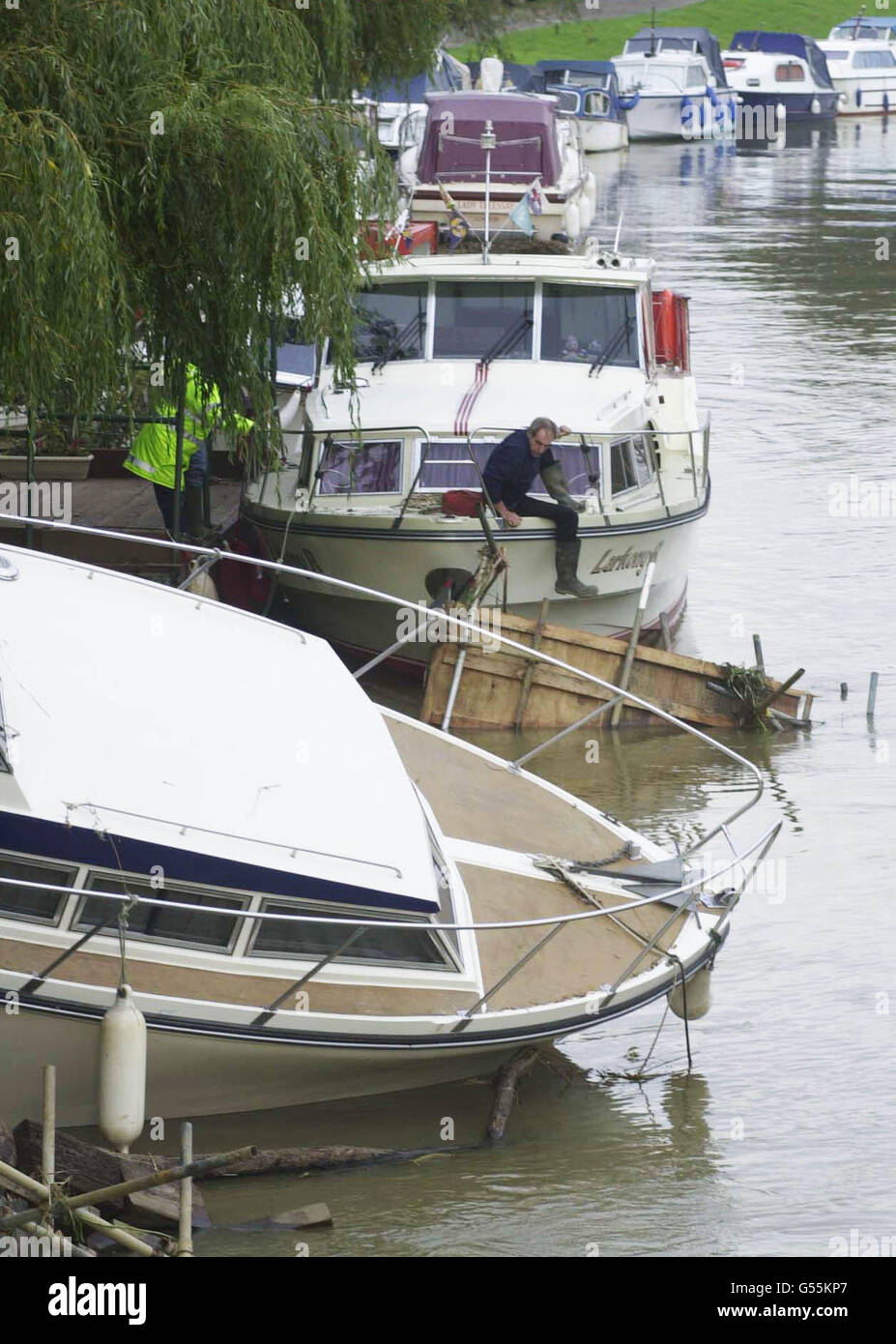Survey the damage to their boat hi-res stock photography and images - Alamy