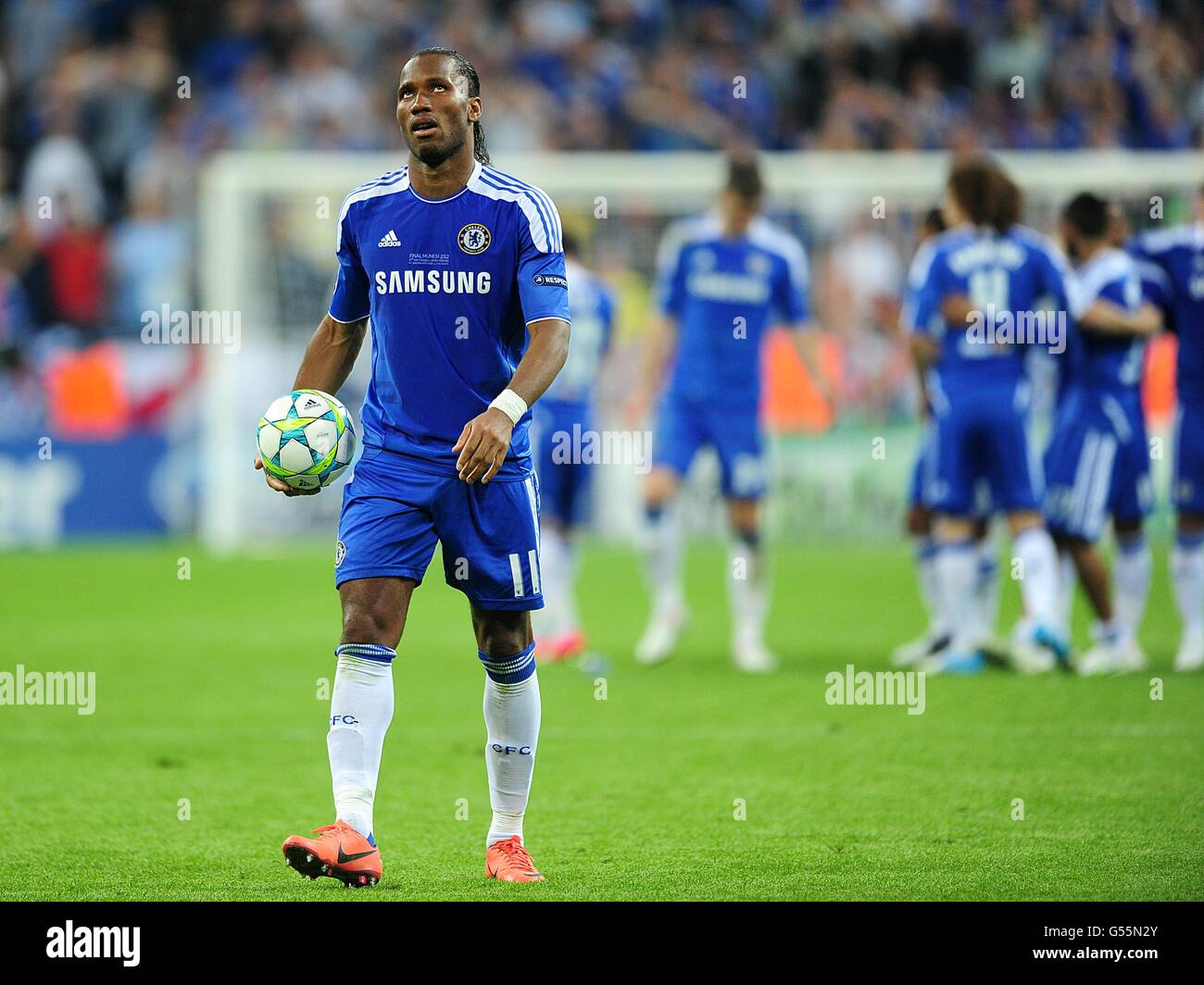 Chelsea's Didier Drogba looks to the skies before scoring the winning ...