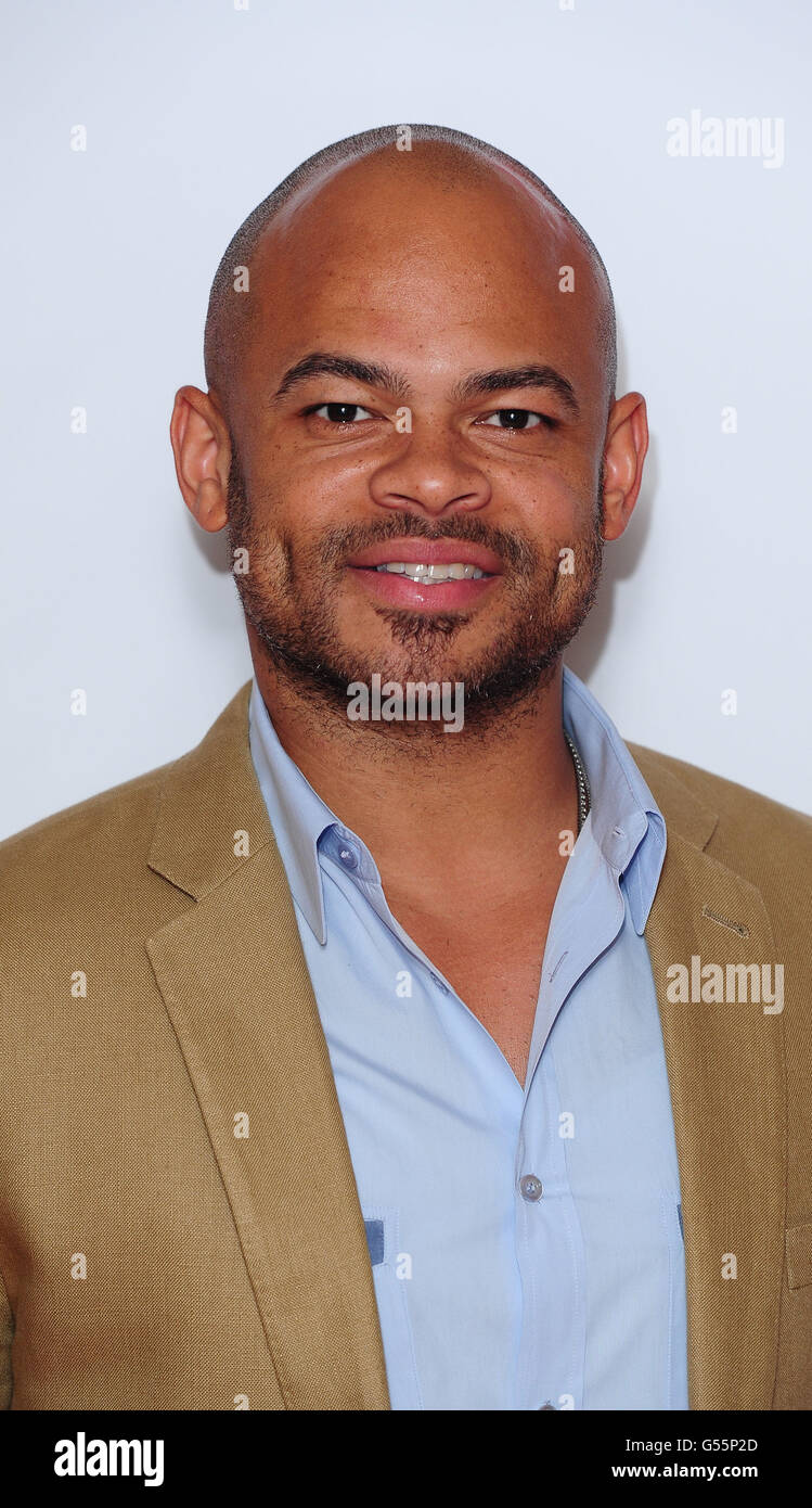Director Anthony Hemingway arriving at the gala screening of Red Tails ...