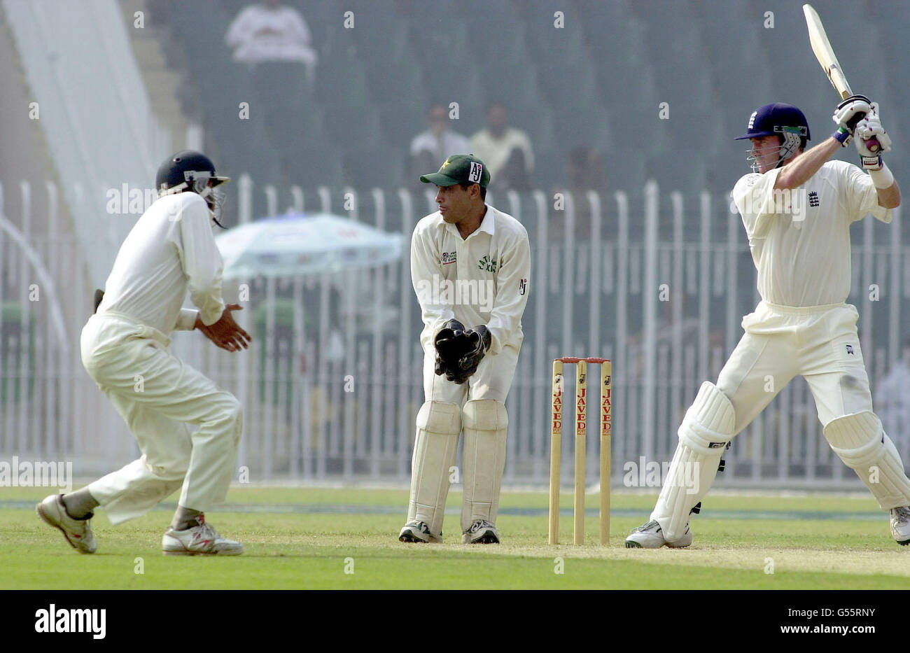 England's Craig White hits out during the third day of their friendly ...