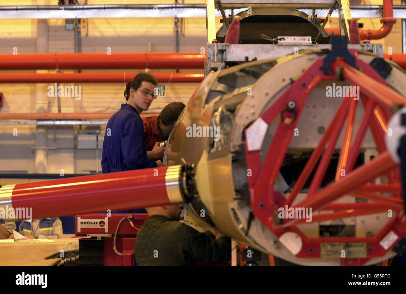 Engineers work on the first production Eurofighter (Typhoon), which was ...