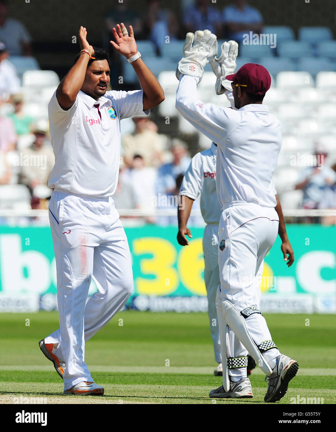 West Indies Ravi Rampaul (left) celebrates with Denesh Ramdin after ...