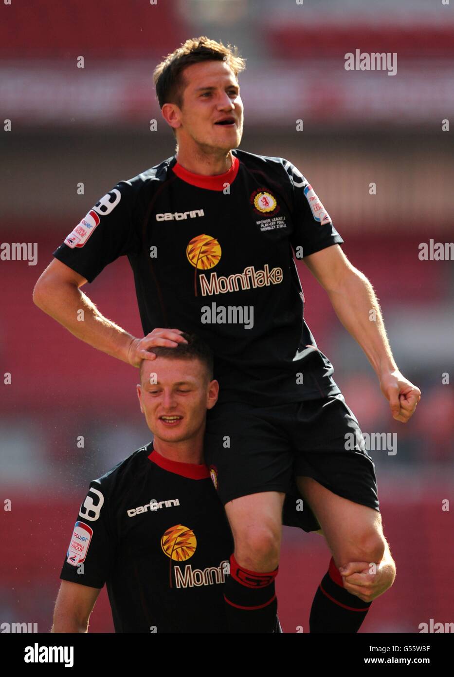 Crewe Alexandra's Matt Tootle (top) celebrates with his team-mate Adam ...