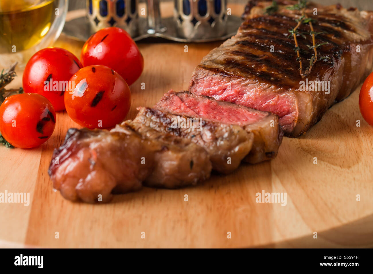 Sliced medium rare grilled Beef steak Ribeye Stock Photo - Alamy
