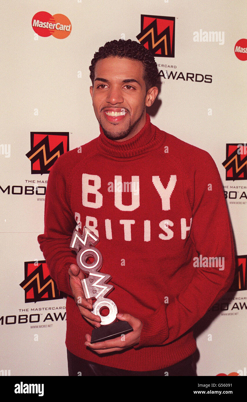 Singer Craig David hold one of the three awards he received at the 5th ...