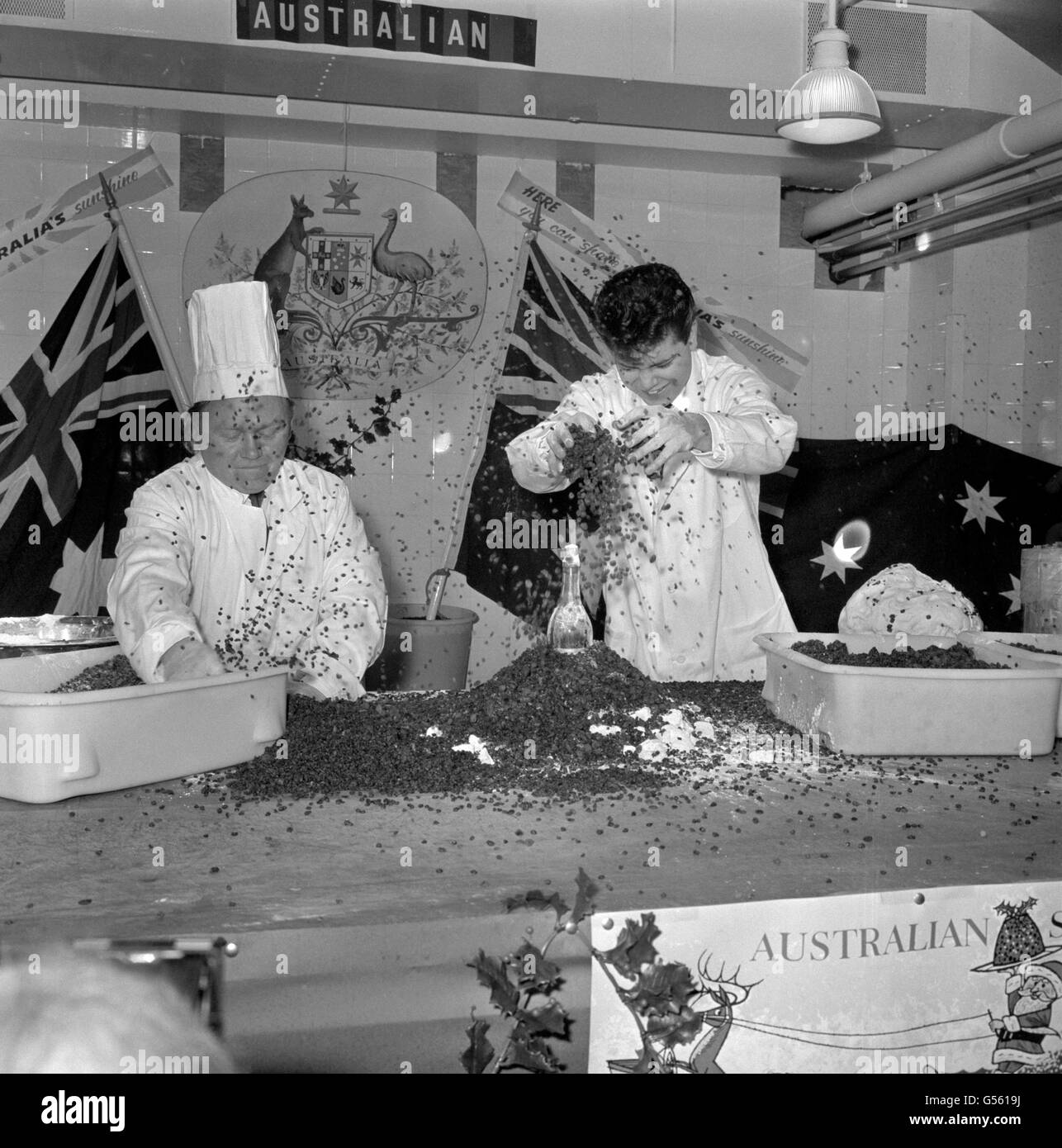 With currants falling like rain, Comedian Charlie Drake, left, and pop ...
