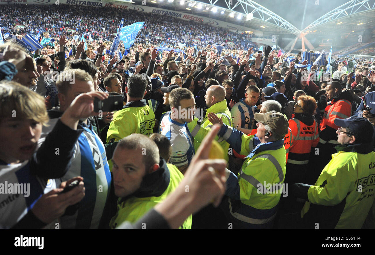 Huddersfield Town captain Peter Clarke leaves the pitch as fans ...