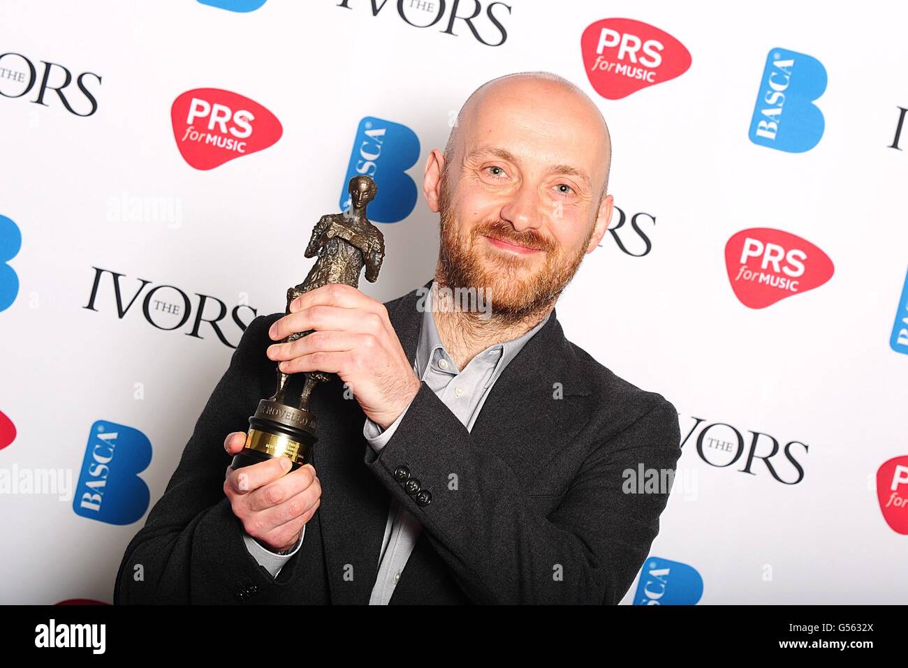 Justin Parker with the award for Best Contemporary Song received for ...