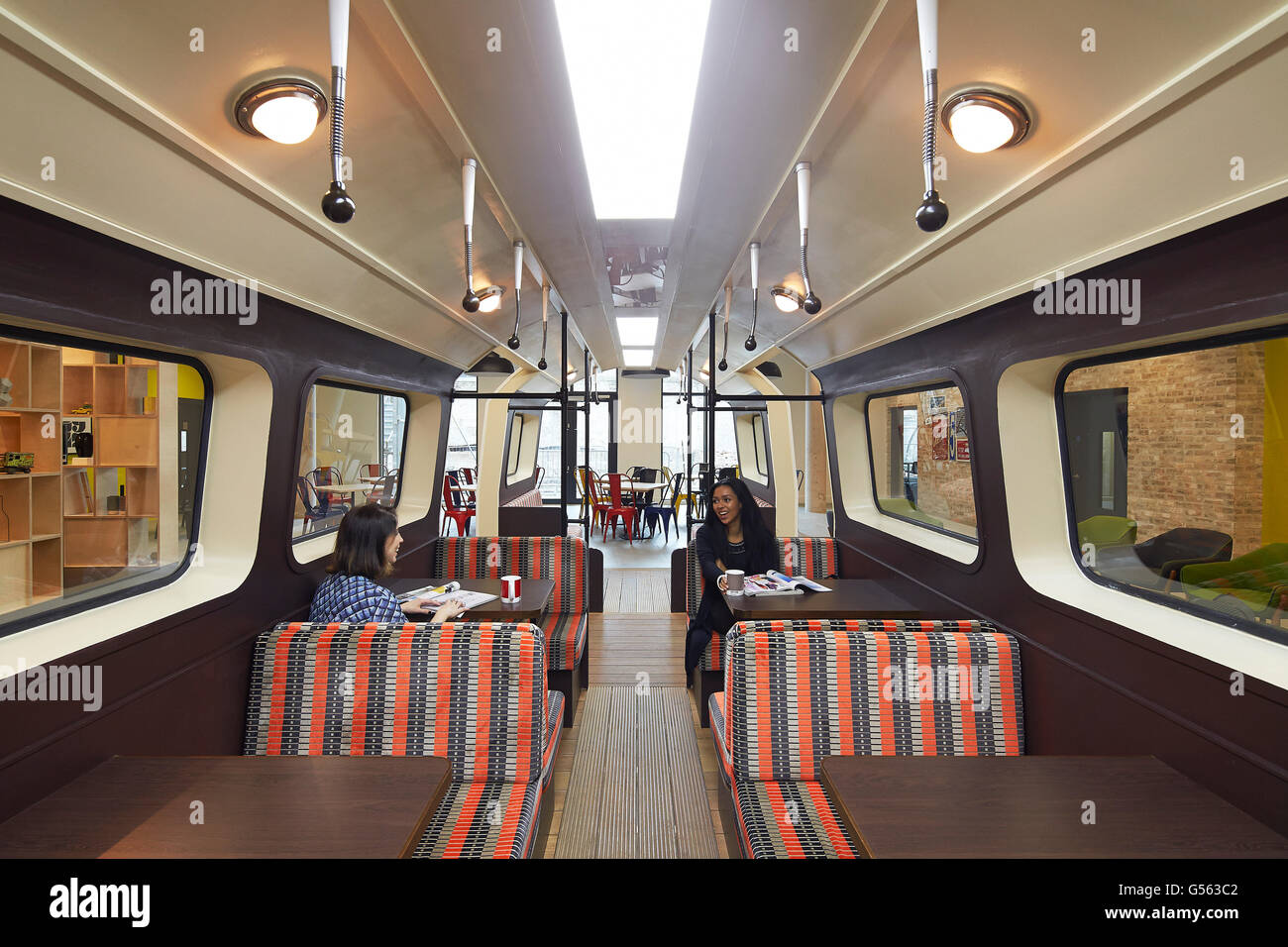 Train cabin as breakout and snack area in student lounge. Spring Mews ...