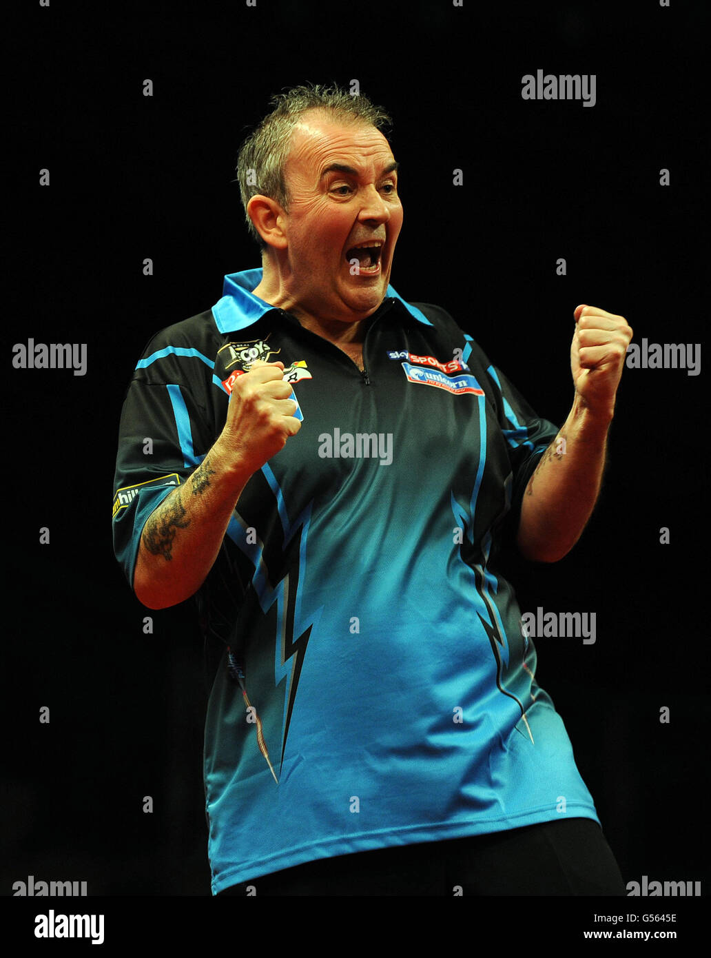 Phil Taylor reacts during the McCoy's Premier League Darts semi-final ...