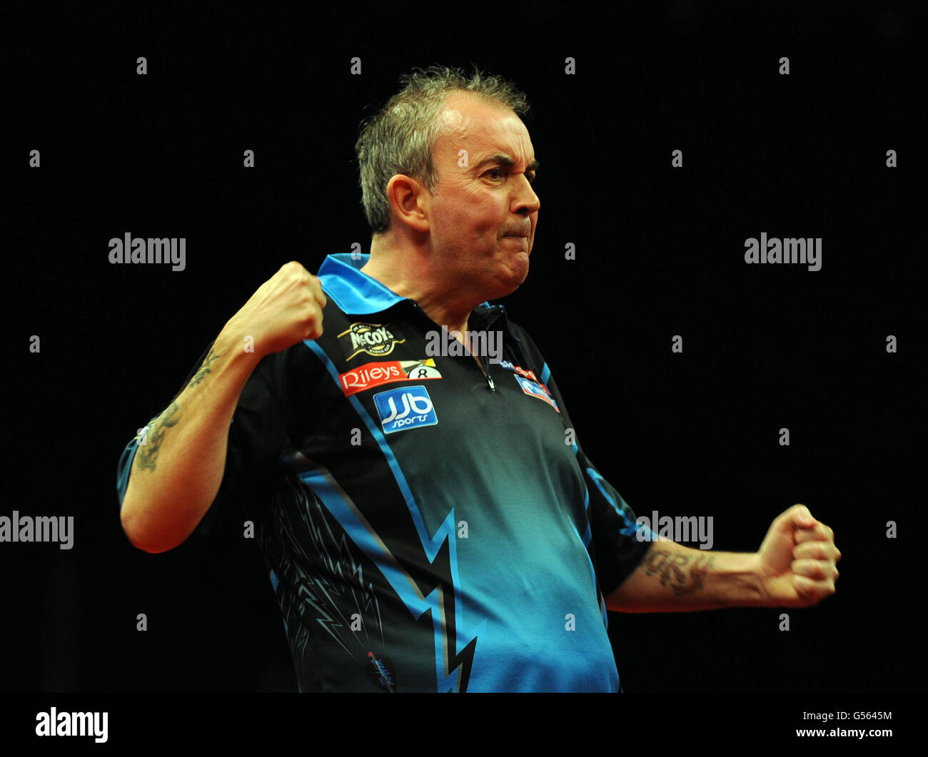Phil Taylor reacts during the McCoy's Premier League Darts semi-final ...
