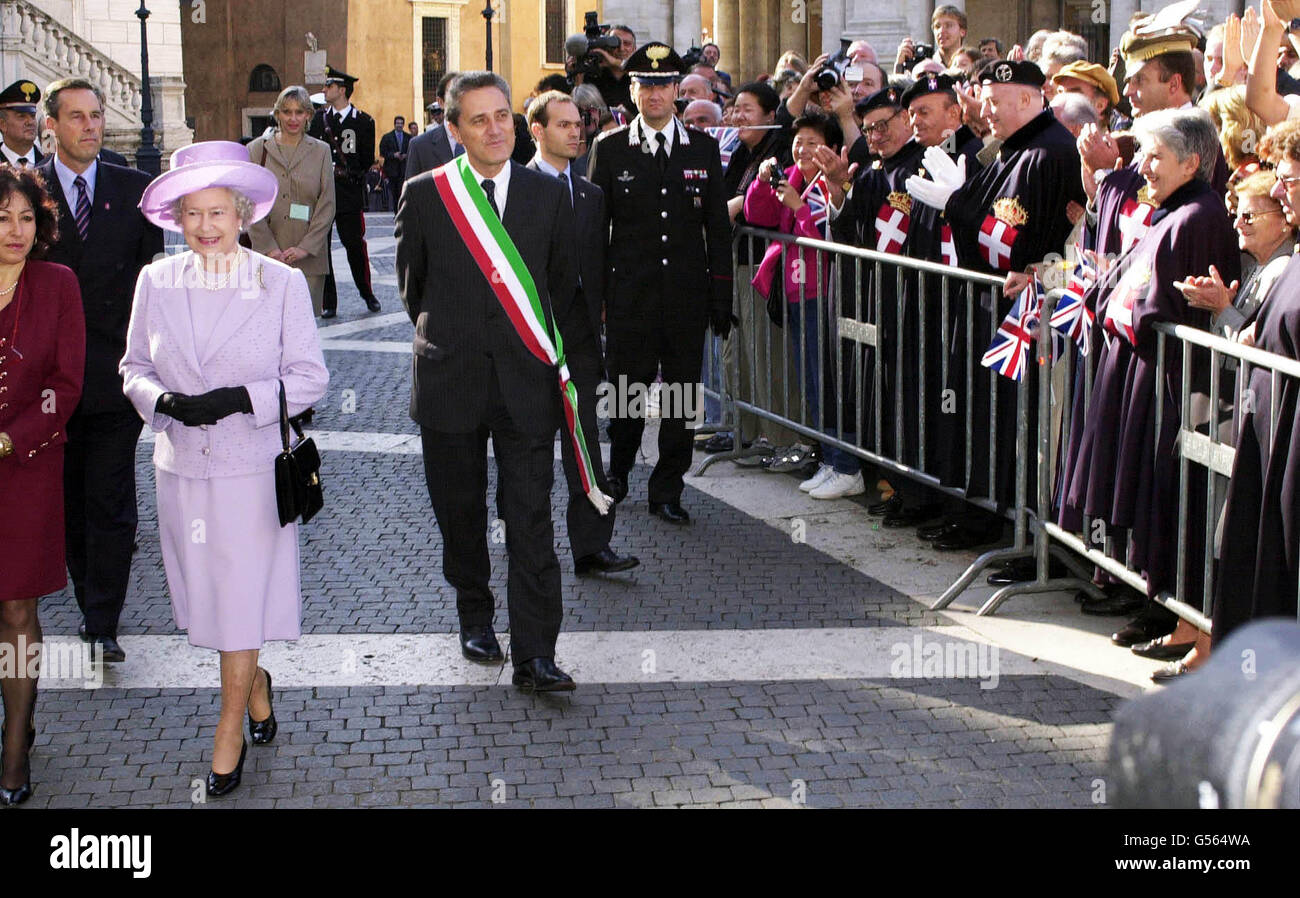 Is greeted by italian monarchists in romes town hall square hi-res ...