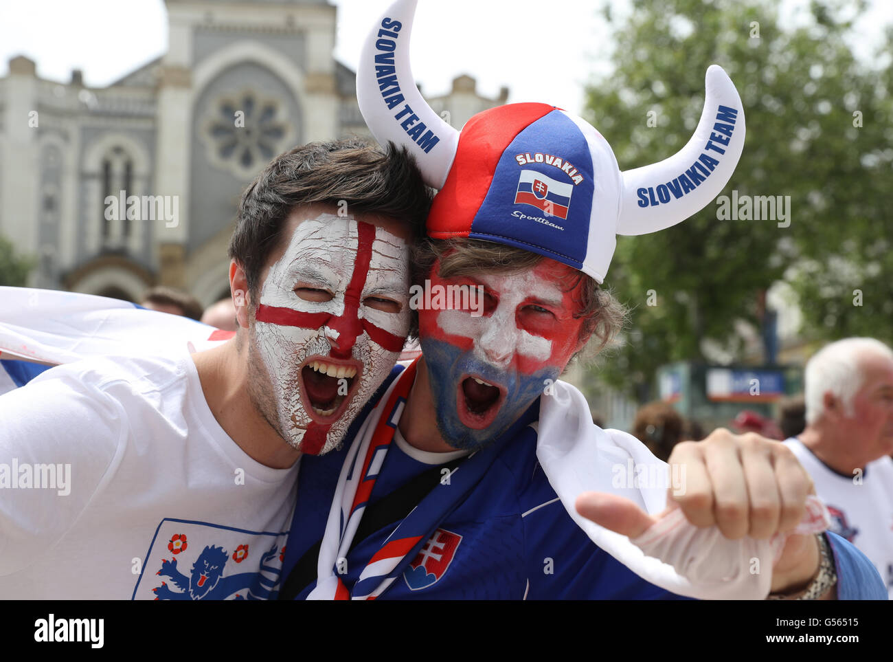 An England and Slovakia fan pose for pictures in Saint-Etienne before ...
