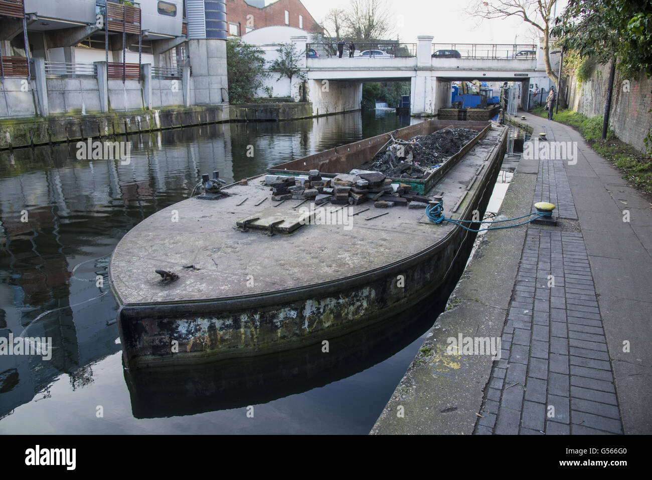 Barge with rubbish dredged from canal, near Camden Lock, Regent's Canal, Camden, London, England ...