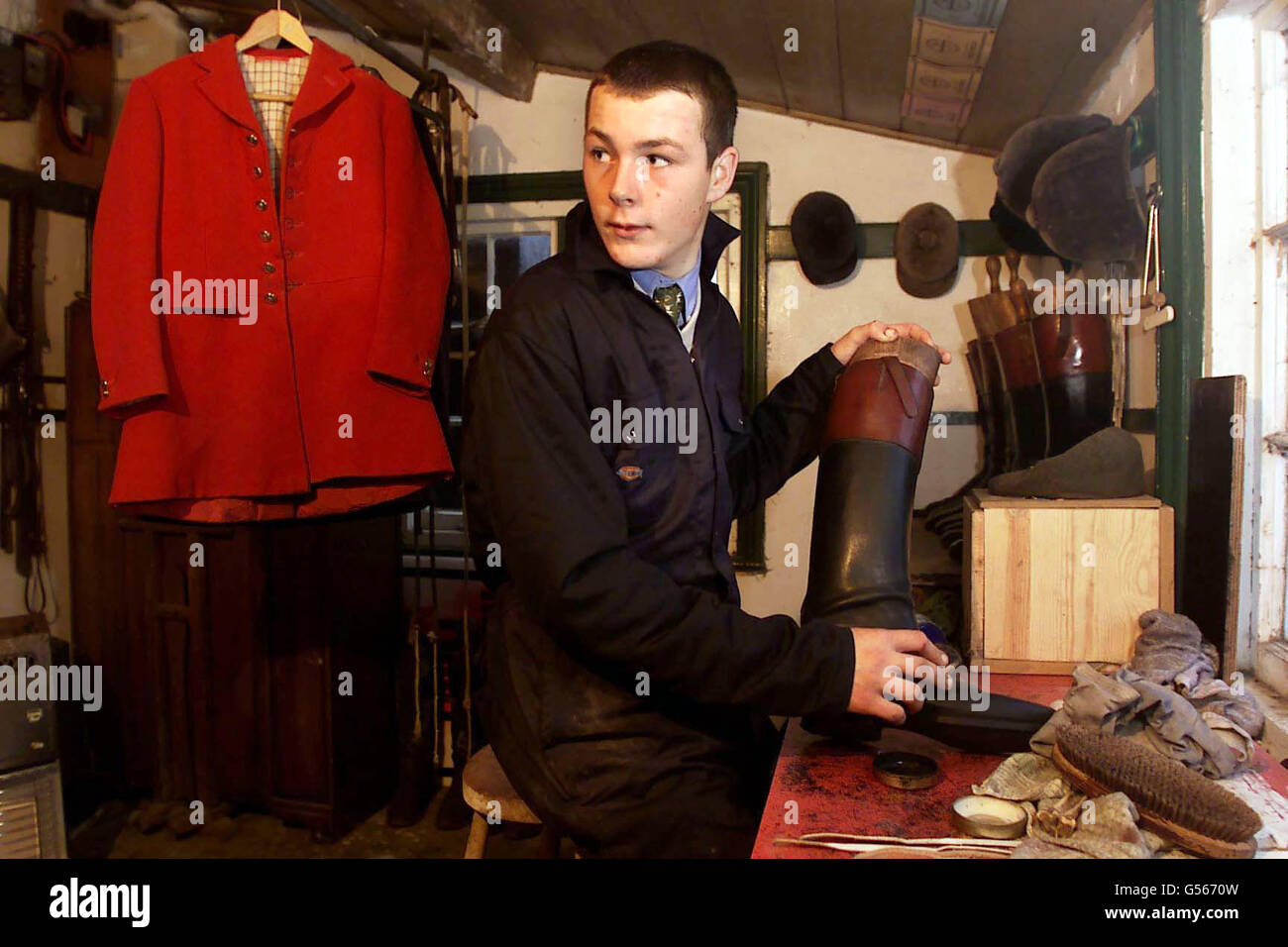 Kennelman Henry Kinchin of the Portman Hunt in Dorset polishes the ...