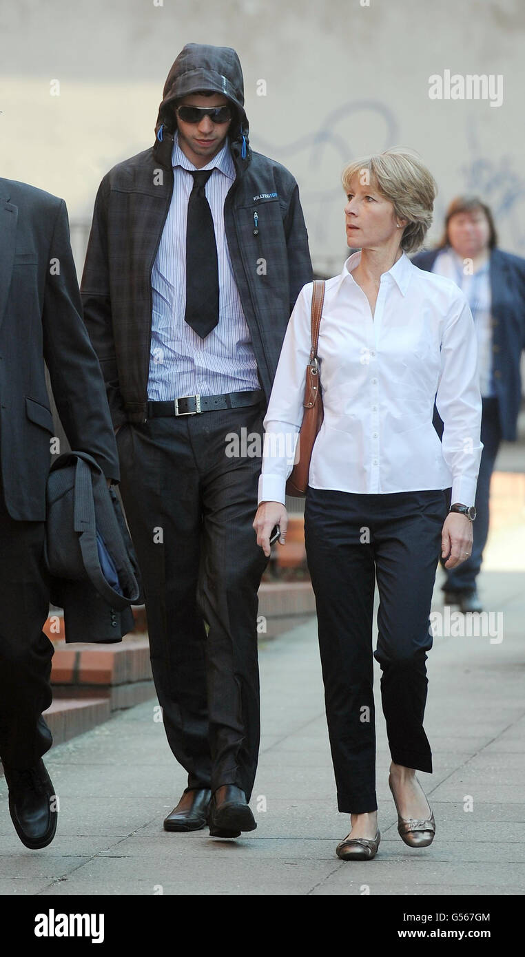 Peter Renshaw arrives with an unidentified woman at Leeds Crown Court ...