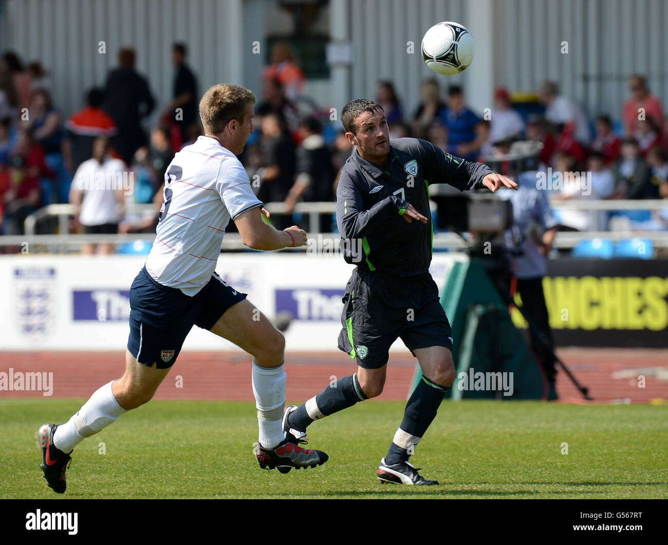 Ireland's Gary Messett (right) controls the ball watched by USA's ...