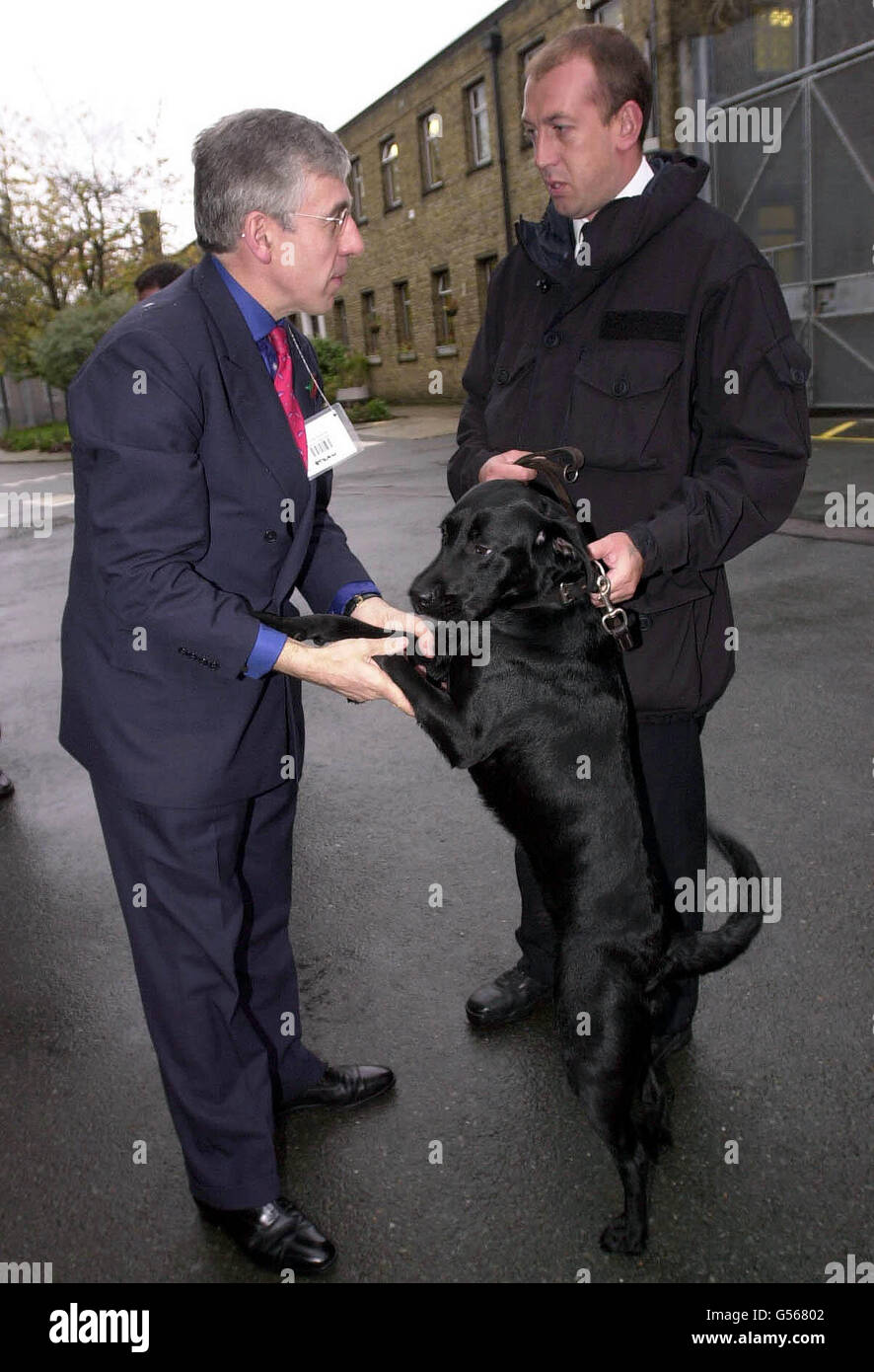 Home Secretary Jack Straw (left) is met by Passive Search Dog, Molly ...