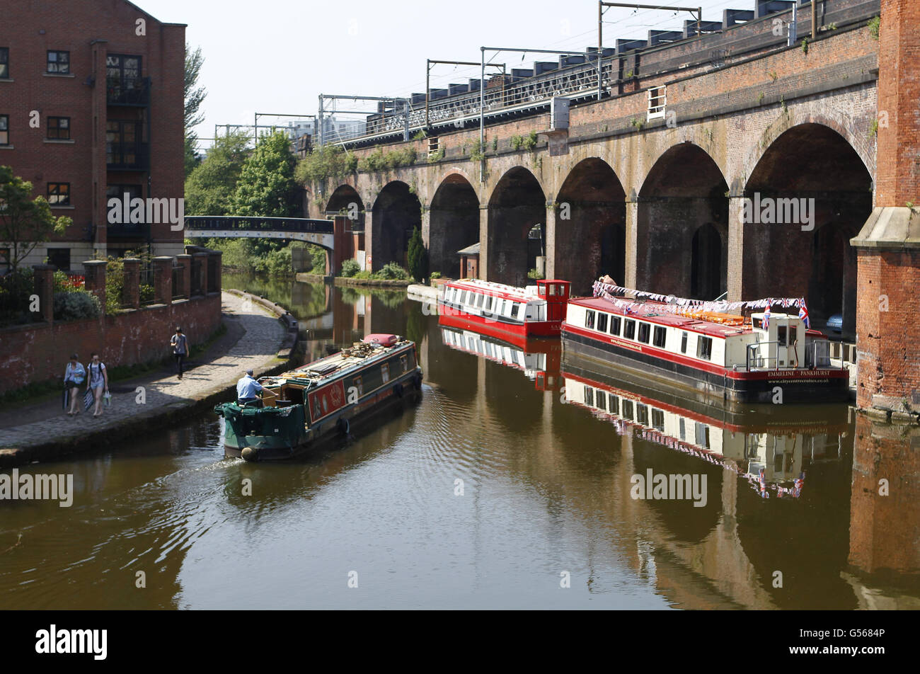 Canal barges make their way along the Manchester Ship Canal in ...
