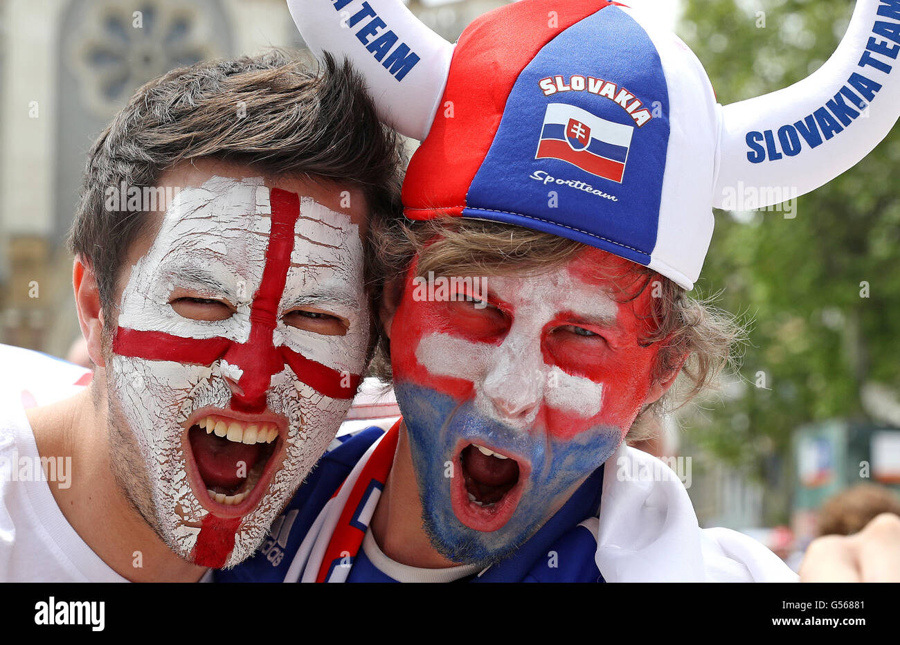 An England and Slovakia fan pose for pictures in Saint-Etienne before ...