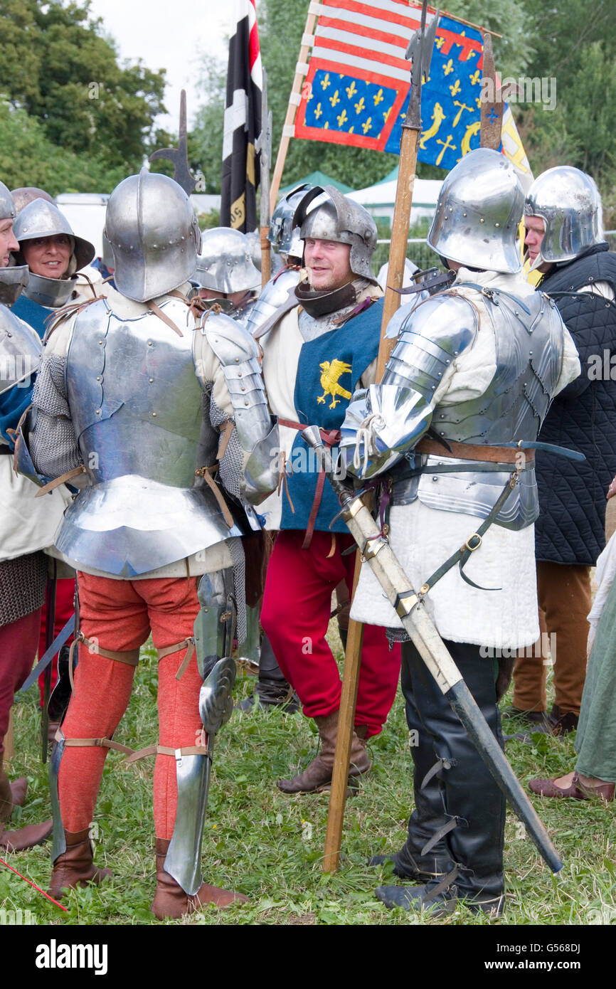 Tewkesbury, UK-July 17, 2015: Reenactor knights in armour laugh ...