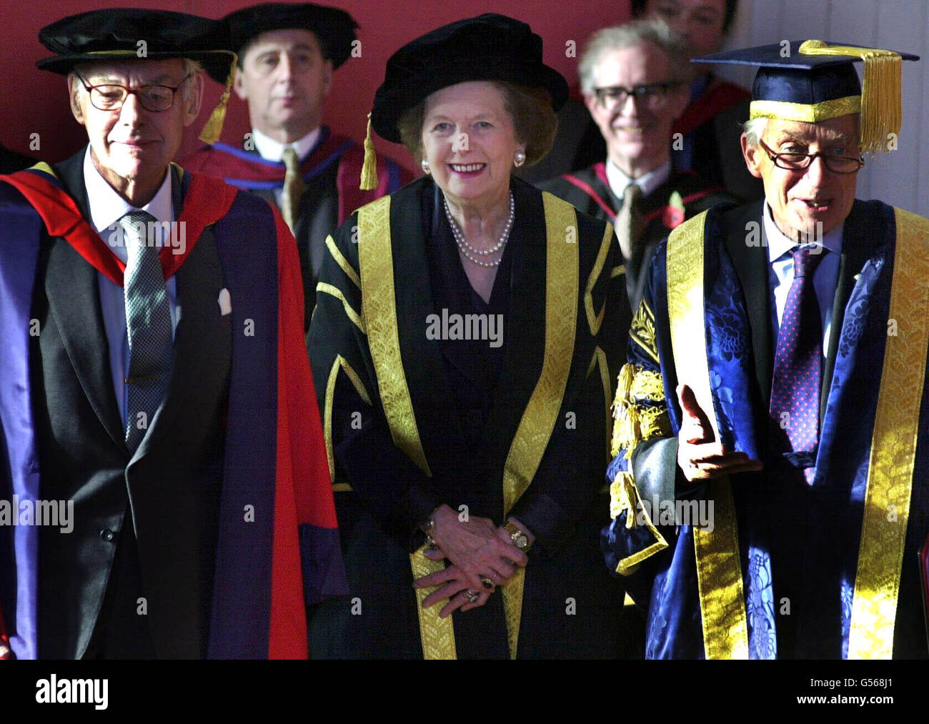 Sir Denis Thatcher (left), accompanied by his wife and former British ...