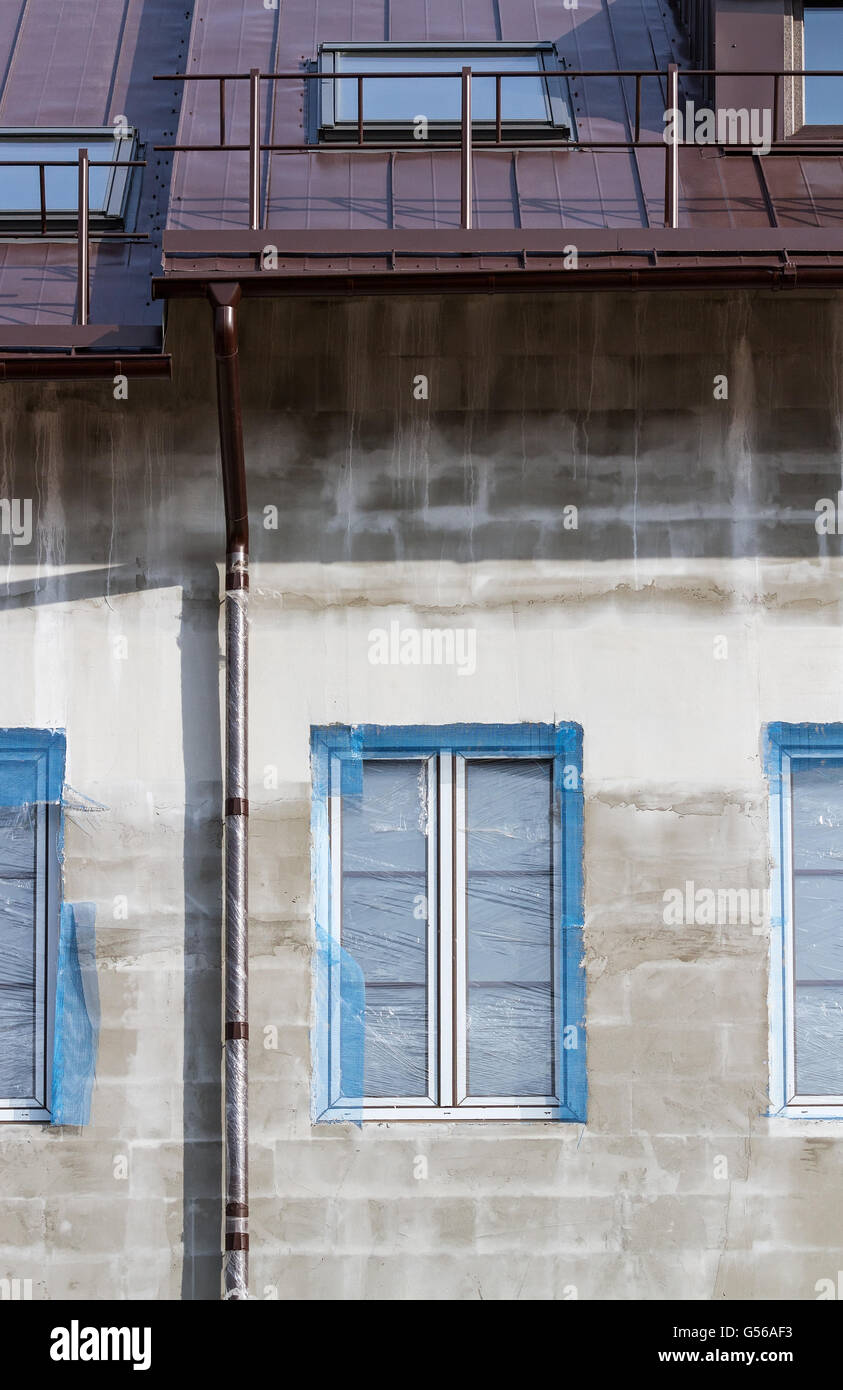 New house construction, wall, roof and gutter Stock Photo - Alamy