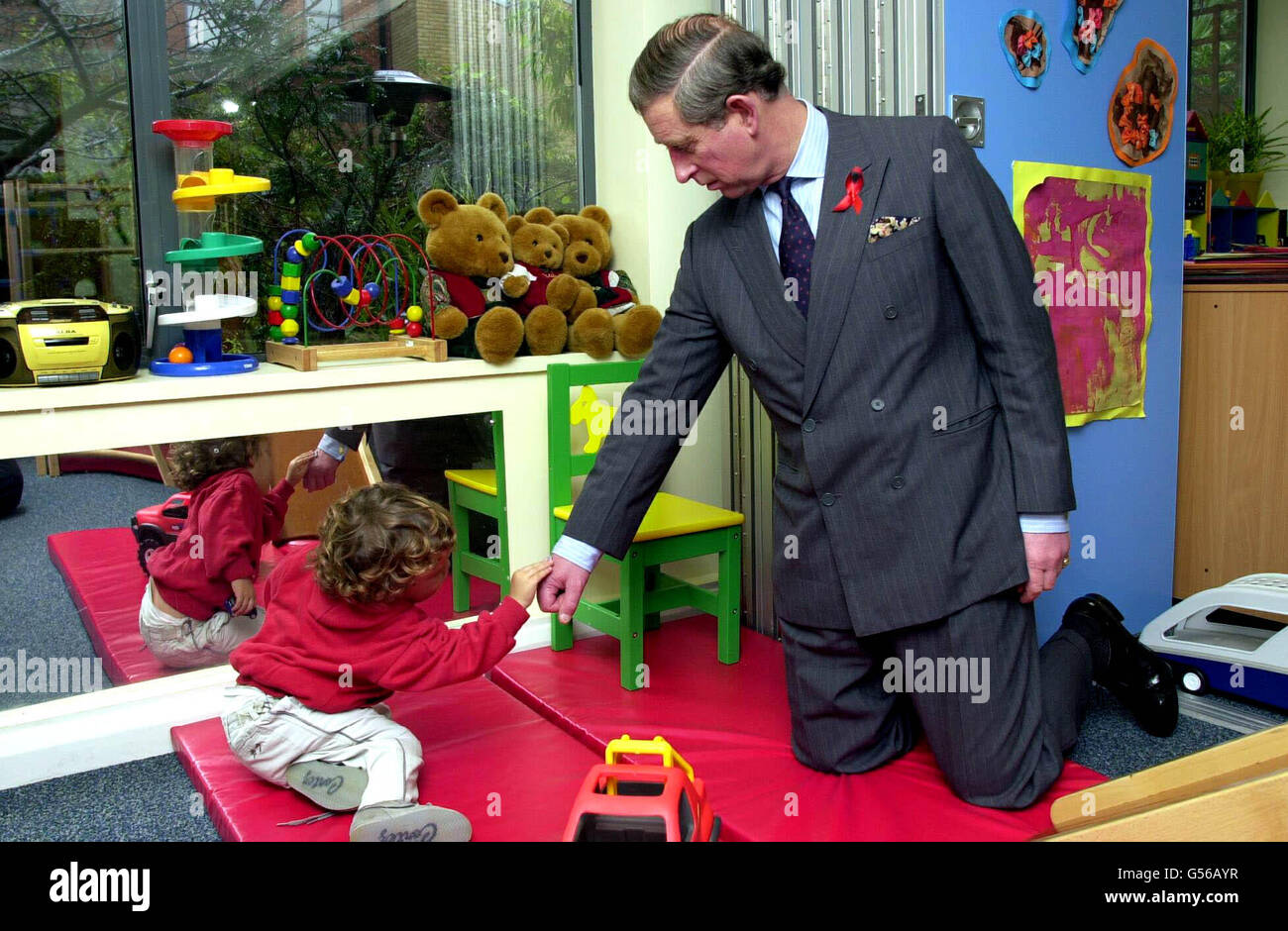 The Prince of Wales with a toddler at in the Brian Shaw Children's ...