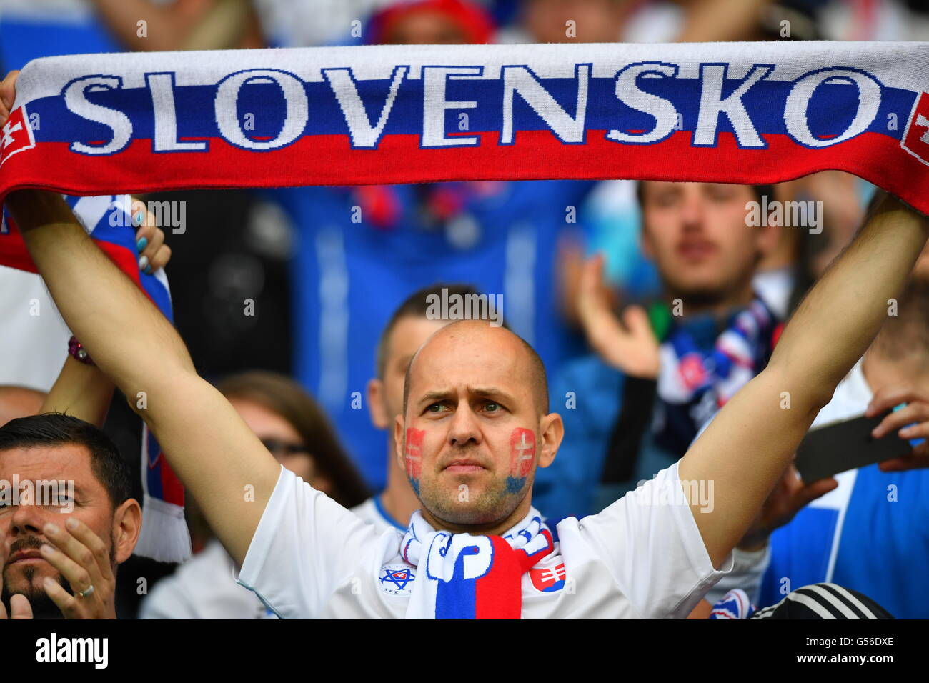 Saint-Etienne, France. 20th June, 2016. A supporter of Slovakia holds a ...