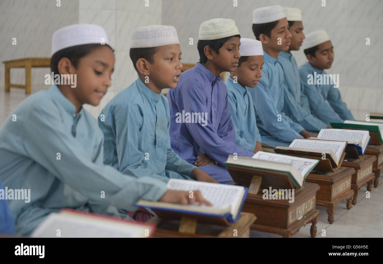 Dhaka, Bangladesh. 20th June, 2016. Bangladeshi Muslim children read ...