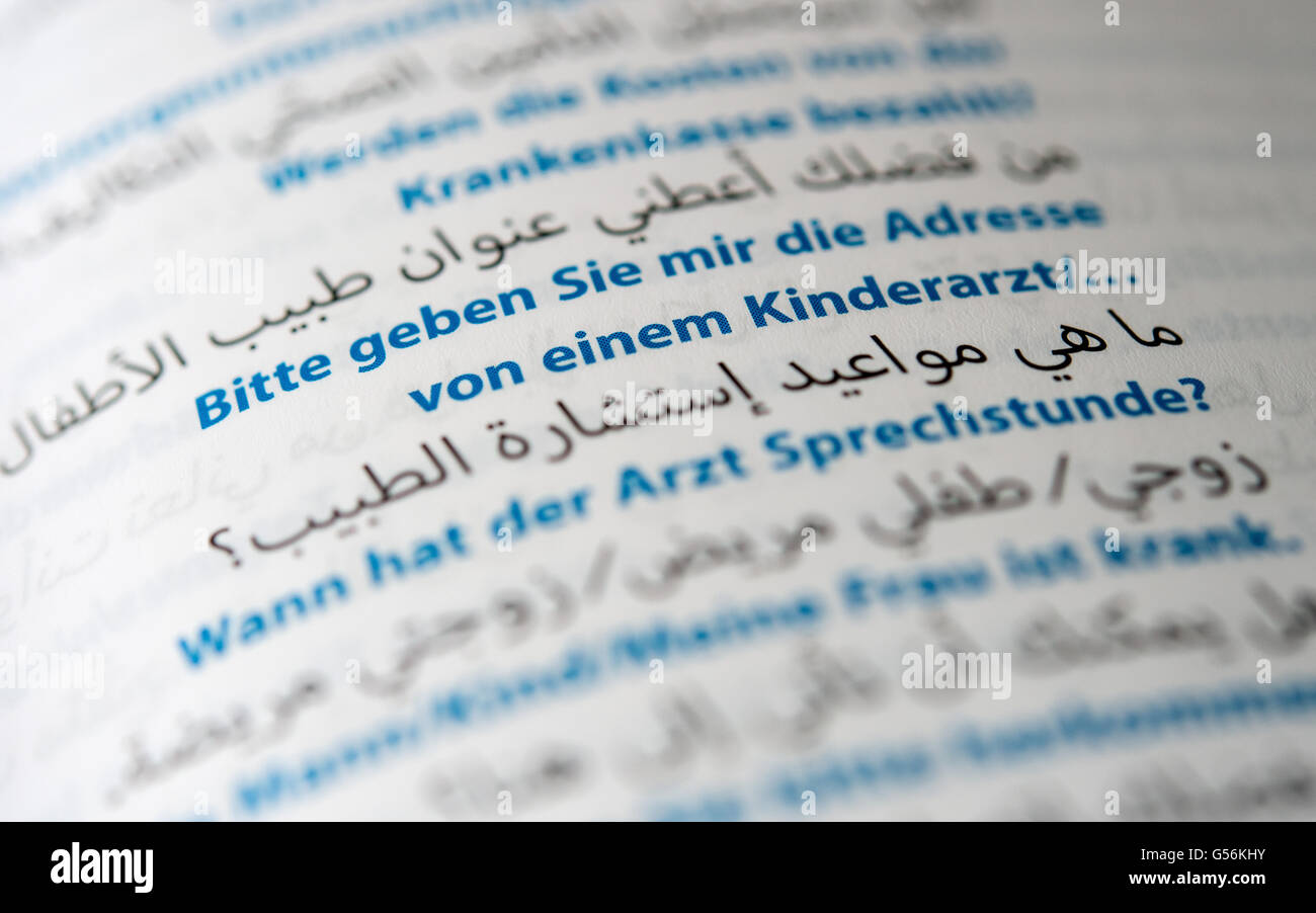 Hanover, Germany. 21st June, 2016. Sentences in German and Arabic on ...