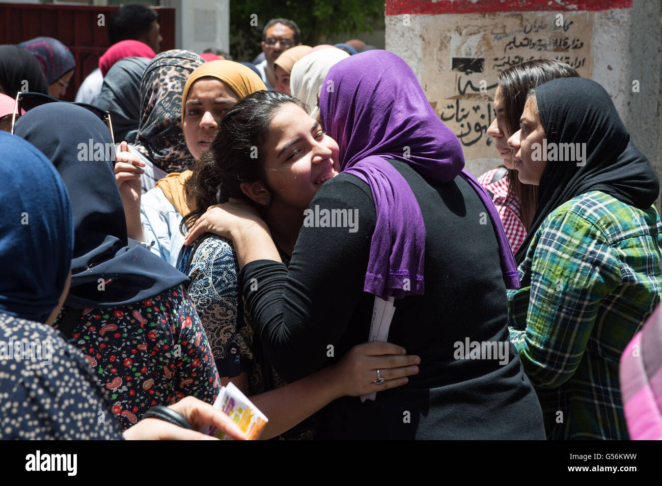 Cairo, Egypt. 21st June, 2016. An Egyptian student hugs her family ...