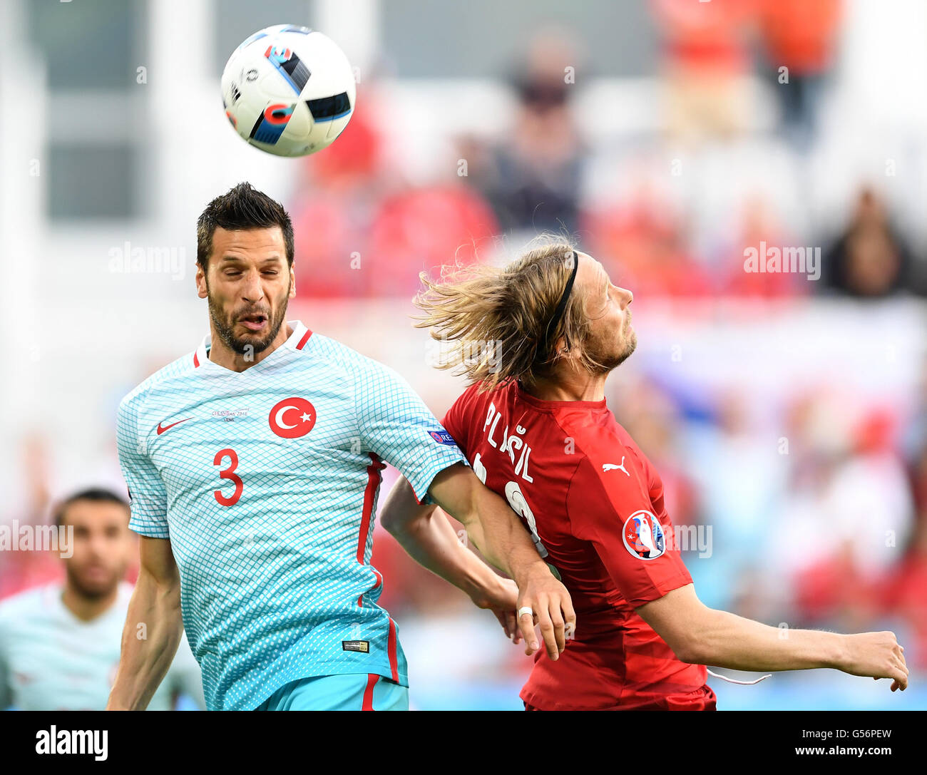 Hakan Balta (L) of Turkey and Jaroslav Plasil of Czech Republic vie for ...