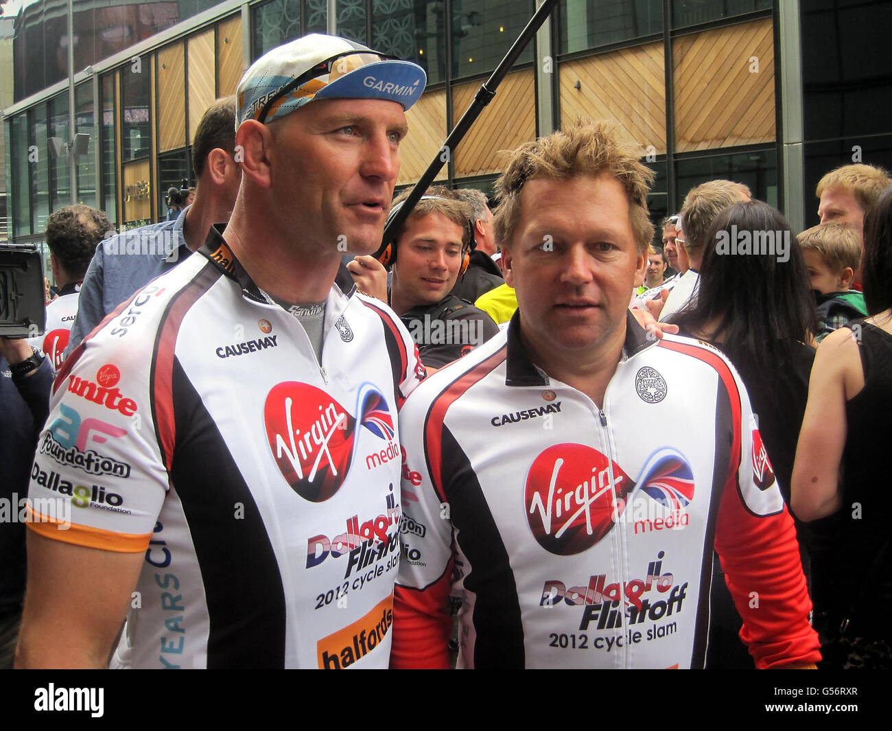 Lawrence Dallaglio, left, joins other riders after completing a ...