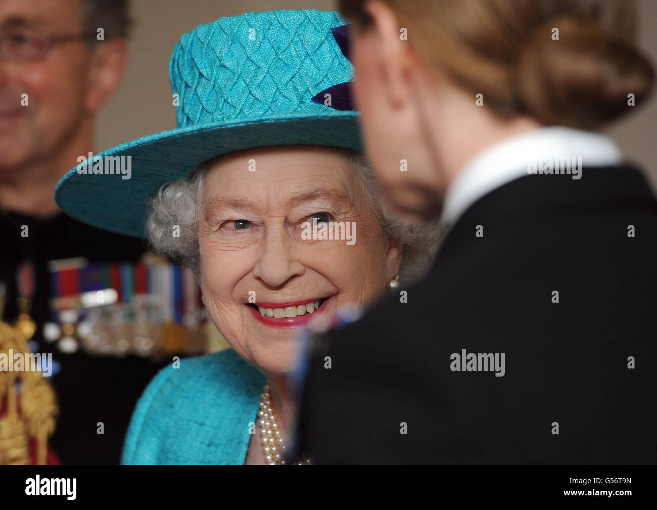 Queen Elizabeth II meets service personnel from the Army, Navy and RAF ...