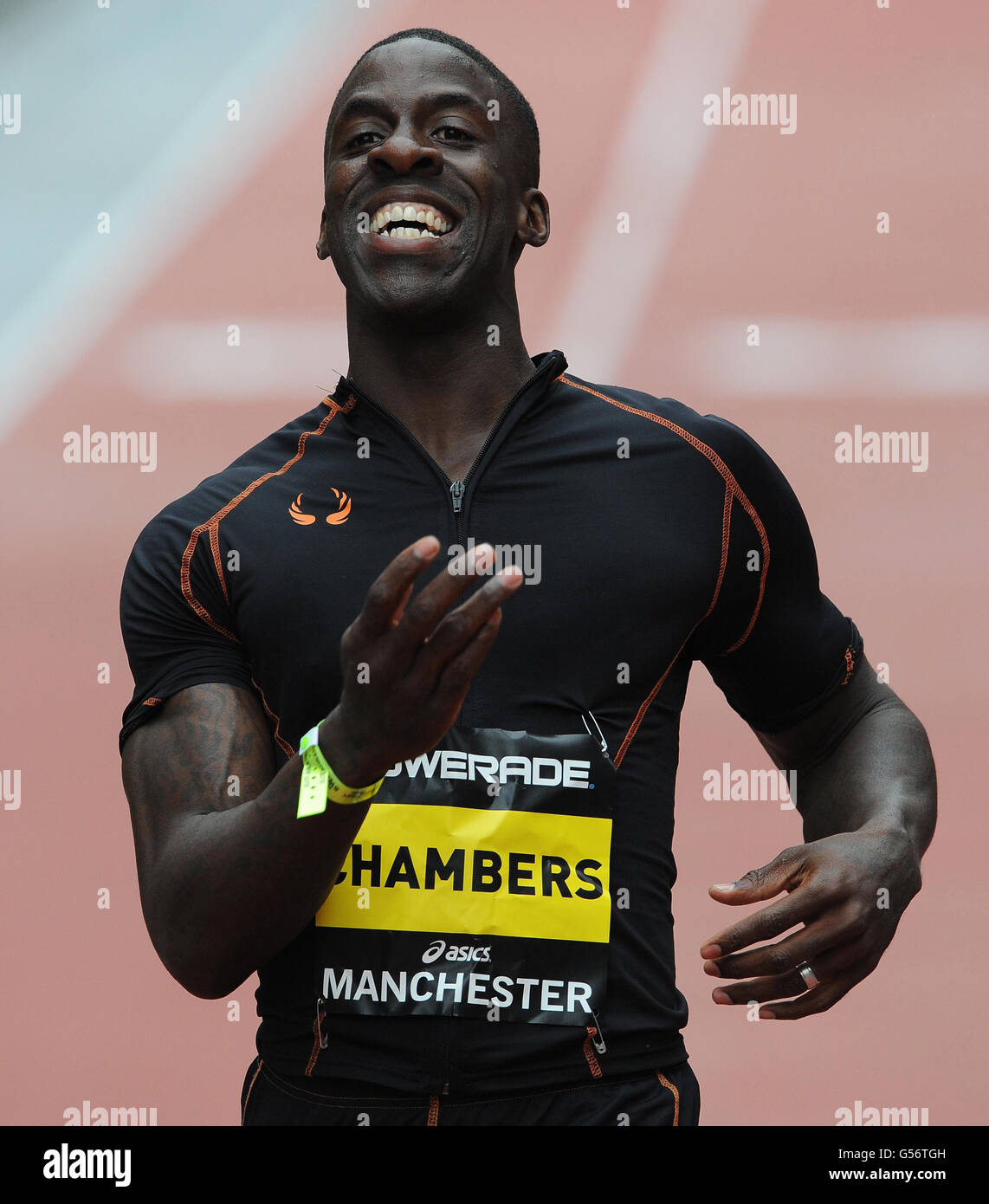 Dwain Chambers (right) reacts after being beaten into second place by ...
