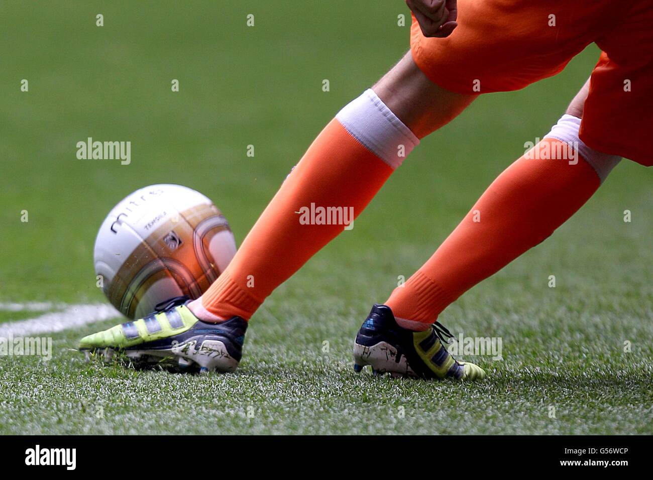 Detail of a blackpool players striking the ball hi-res stock ...