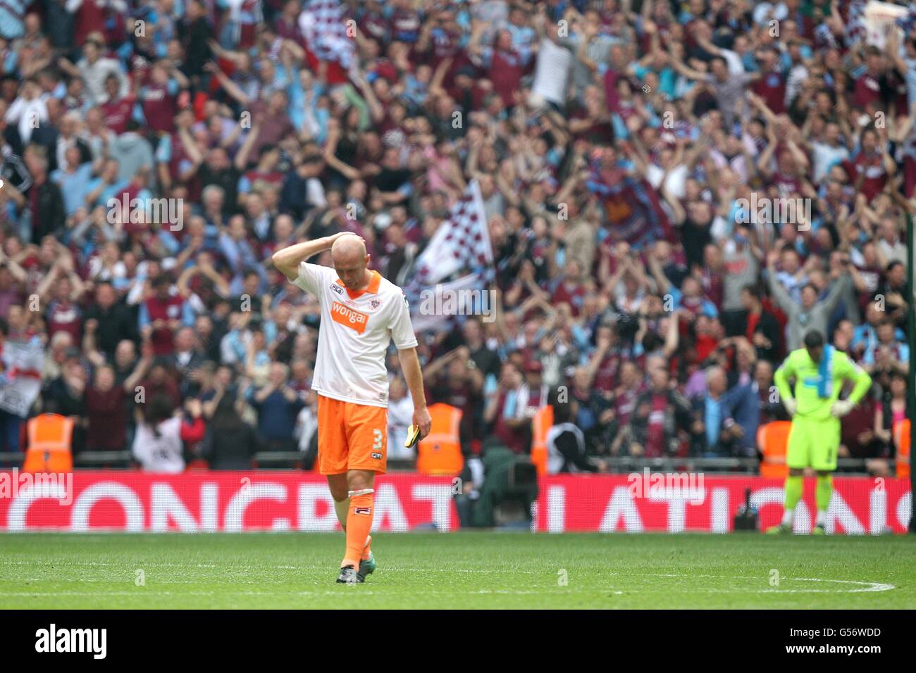 Blackpool's Stephen Crainey (left) and goalkeeper Matthew Gilks stand ...