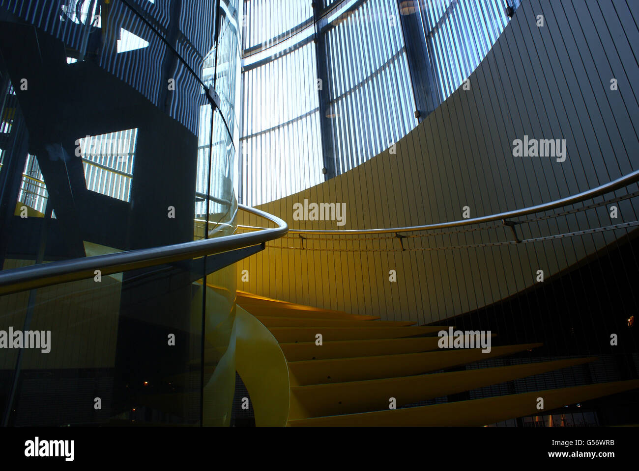 Photograph of a metal yellow abstract stairs Stock Photo - Alamy