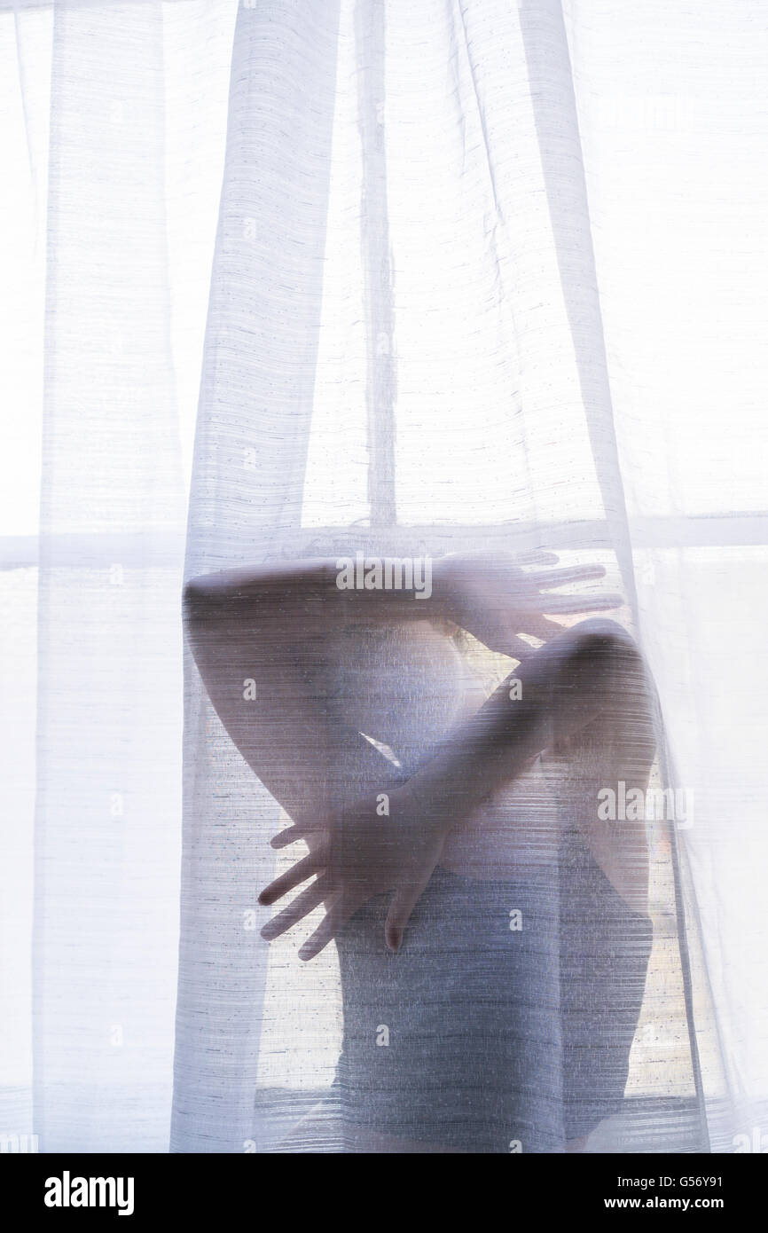 Woman curtain window hi-res stock photography and images - Alamy