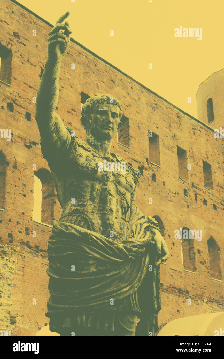 Roman statue of Caesar Augustus in front of roman walls vintage Stock ...