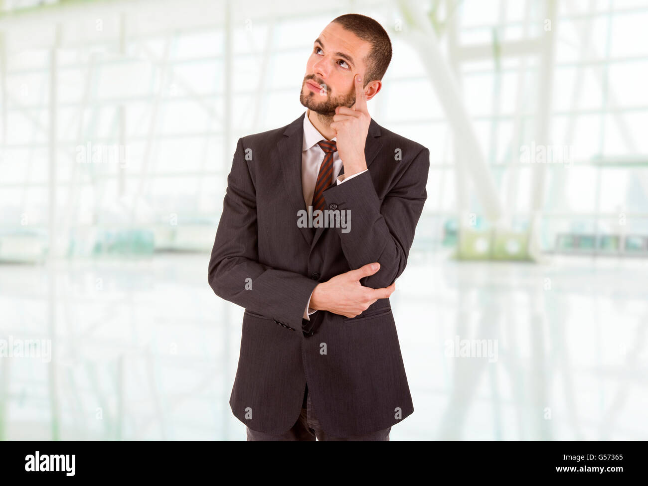 young business man thinking at the office Stock Photo - Alamy